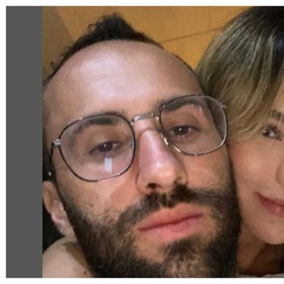 David Ospina en el conicerto de Wisin y Yandel con su esposa